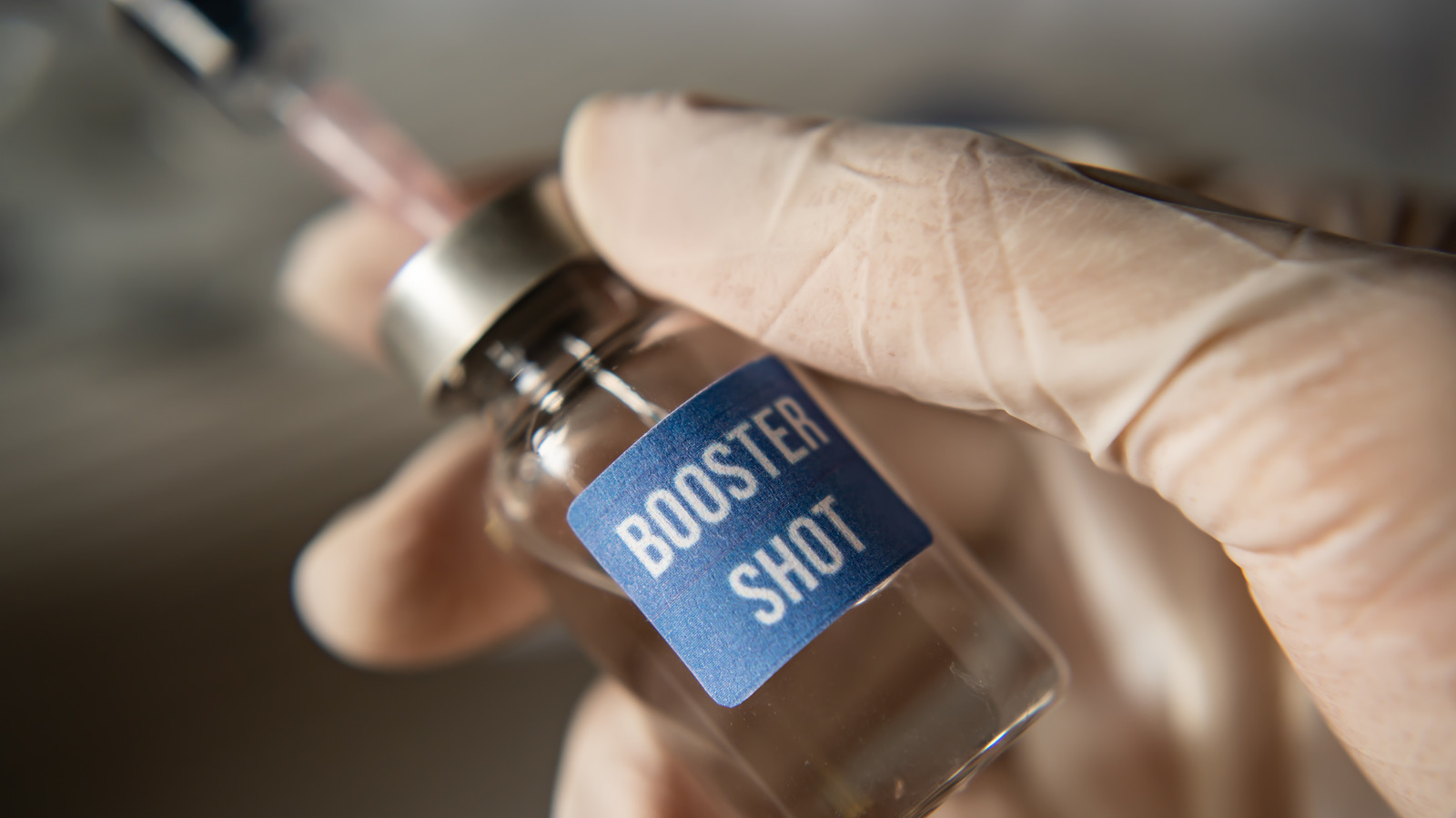 Side Effects Of Pfizer's COVID-19 Booster Shot Explained