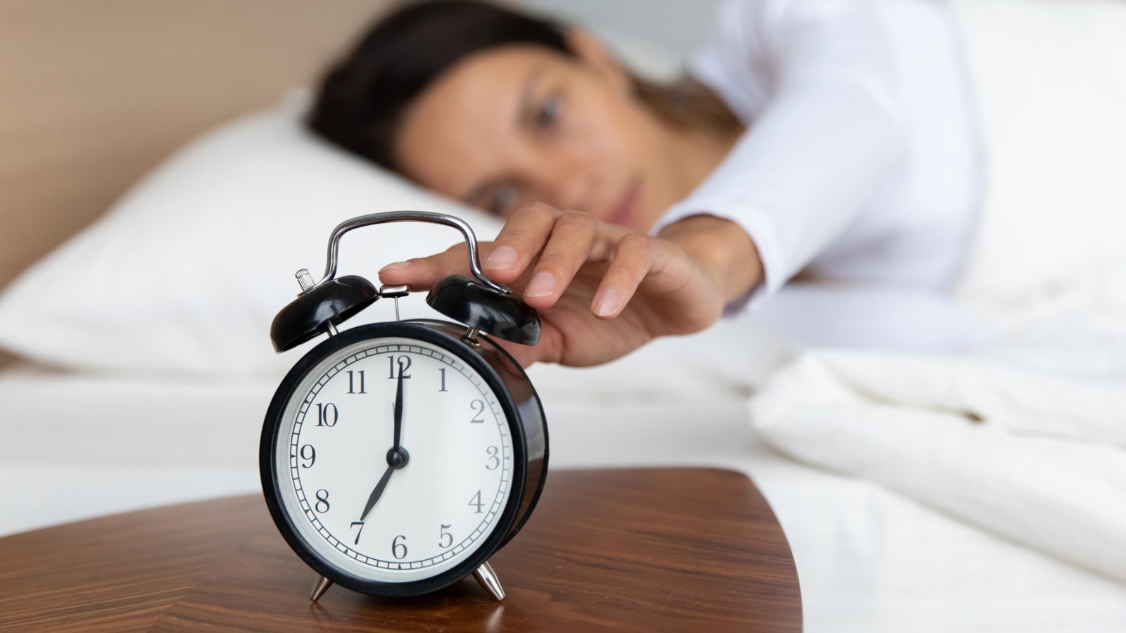 Think Twice About Sleeping Through Your Alarm (And How To Prevent It)
